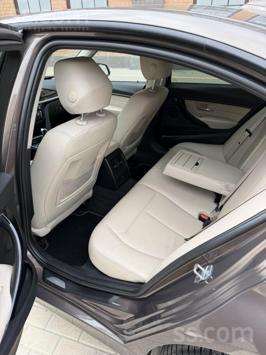 Brown BMW 318 2014 in Riga, with an engine capacity of 2.00 L and mileage of 173 thousand km for 10600 €, photo 12 on AUTOMOTO.COM.LV