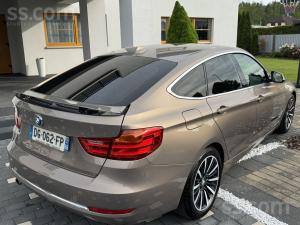 Brown BMW 318 2014 in Riga, with an engine capacity of 2.00 L and mileage of 240 thousand km for 10600 €, photo 6 on AUTOMOTO.COM.LV