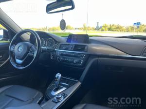 Brown BMW 318 2013 in Rezekne, with an engine capacity of 2.00 L and mileage of 263 thousand km for 7790 €, photo 12 on AUTOMOTO.COM.LV