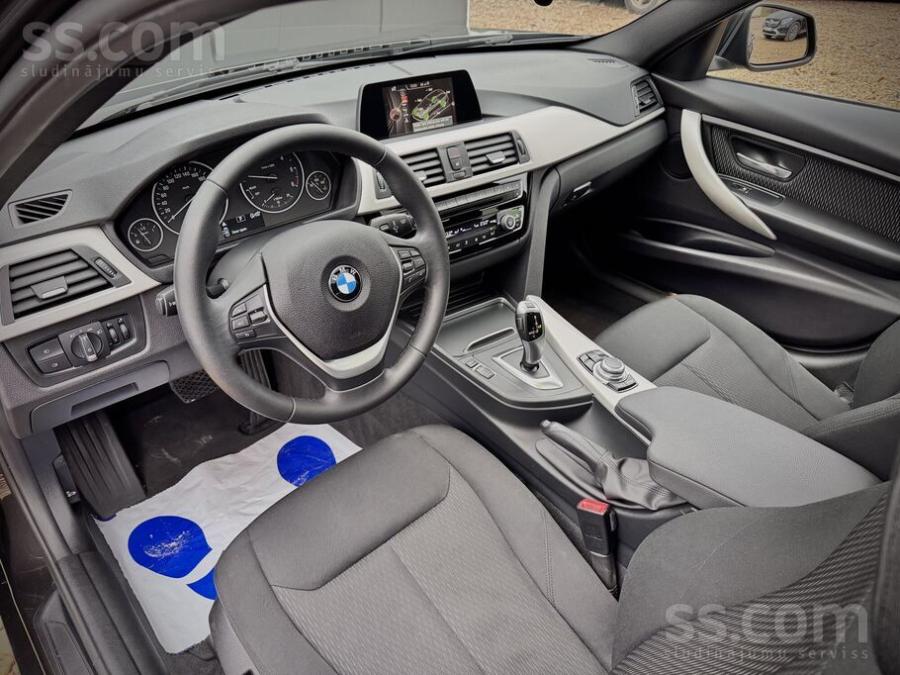 Brown BMW 318 2016 in Riga, with an engine capacity of 2.00 L and mileage of 214 thousand km for 10990 €, photo 12 on AUTOMOTO.COM.LV