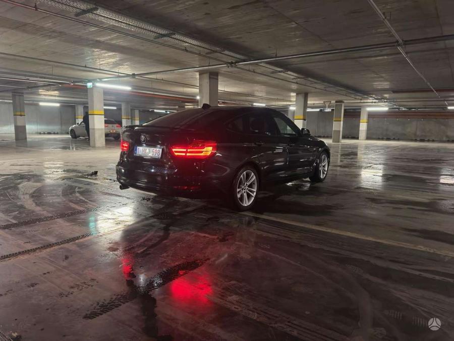 Black BMW 318 Gran Turismo 2013 in Kaunas, with an engine capacity of 2.00 L and mileage of 227 thousand km for 9600 €, photo 5 on AUTOMOTO.COM.LV
