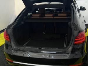 Black BMW 318 Gran Turismo 2013 in Avizieniai, with an engine capacity of 2.00 L and mileage of 276 thousand km for 9990 €, photo 13 on AUTOMOTO.COM.LV