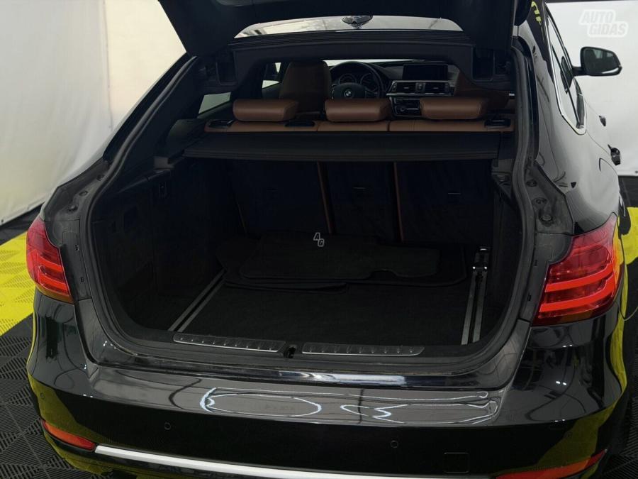 Black BMW 318 Gran Turismo 2013 in Avizieniai, with an engine capacity of 2.00 L and mileage of 276 thousand km for 9990 €, photo 13 on AUTOMOTO.COM.LV