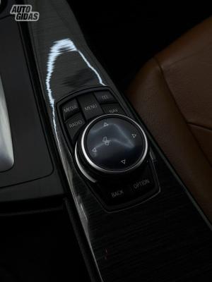 Black BMW 318 Gran Turismo 2013 in Avizieniai, with an engine capacity of 2.00 L and mileage of 276 thousand km for 9990 €, photo 23 on AUTOMOTO.COM.LV