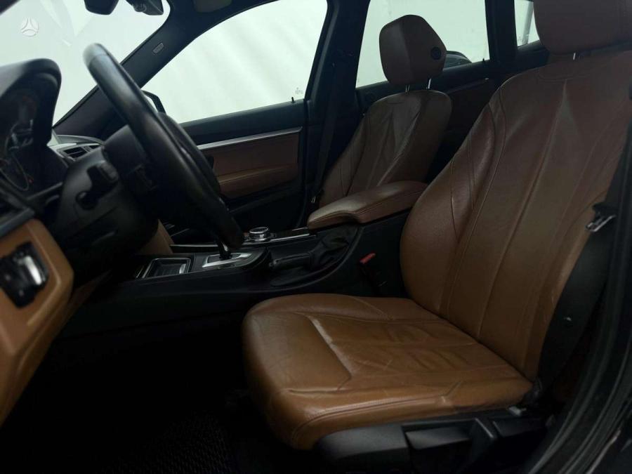 Black BMW 318 Gran Turismo 2013 in Vilnius, with an engine capacity of 2.00 L and mileage of 276 thousand km for 8990 €, photo 11 on AUTOMOTO.COM.LV