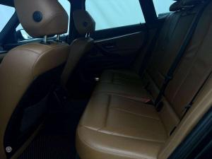 Black BMW 318 Gran Turismo 2013 in Vilnius, with an engine capacity of 2.00 L and mileage of 276 thousand km for 8990 €, photo 12 on AUTOMOTO.COM.LV
