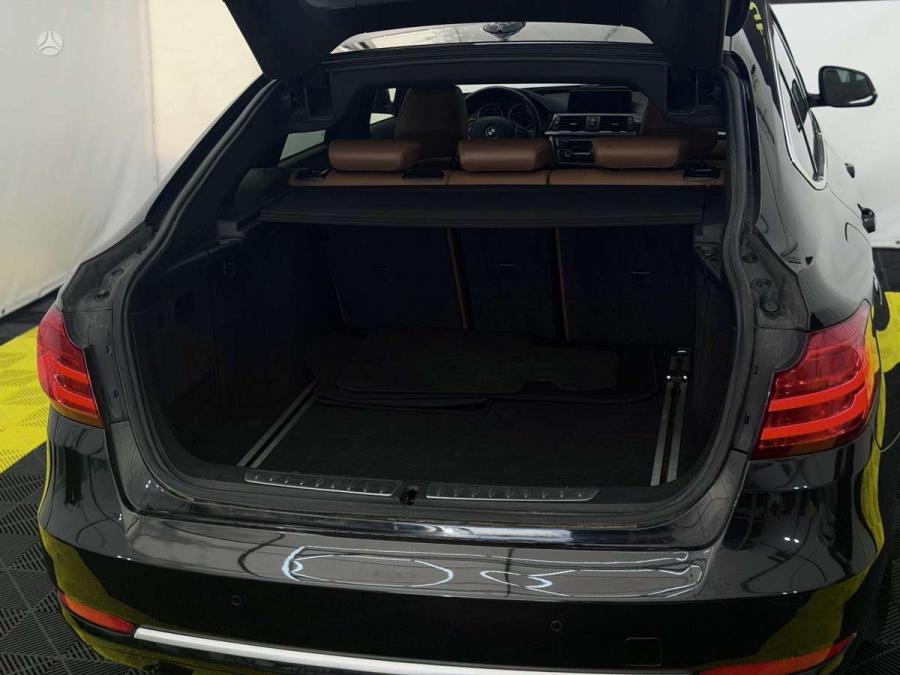Black BMW 318 Gran Turismo 2013 in Vilnius, with an engine capacity of 2.00 L and mileage of 276 thousand km for 8990 €, photo 13 on AUTOMOTO.COM.LV