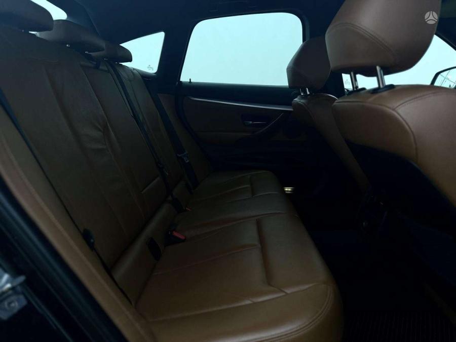 Black BMW 318 Gran Turismo 2013 in Vilnius, with an engine capacity of 2.00 L and mileage of 276 thousand km for 8990 €, photo 15 on AUTOMOTO.COM.LV