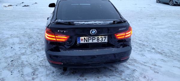 Black BMW 318 Gran Turismo 2016 in Siauliai, with an engine capacity of 2.00 L and mileage of 350 thousand km for 10999 €, photo 5 on AUTOMOTO.COM.LV