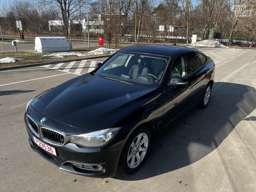 Black BMW 318 Gran Turismo 2013 in Panevezys, with an engine capacity of 2.00 L and mileage of 317 thousand km for 6499 €, photo 1 on AUTOMOTO.COM.LV