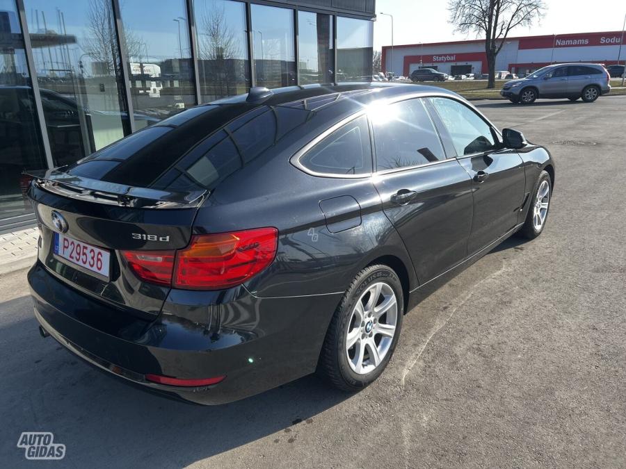 Black BMW 318 Gran Turismo 2013 in Panevezys, with an engine capacity of 2.00 L and mileage of 317 thousand km for 6499 €, photo 3 on AUTOMOTO.COM.LV