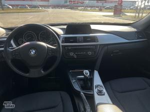 Black BMW 318 Gran Turismo 2013 in Panevezys, with an engine capacity of 2.00 L and mileage of 317 thousand km for 6499 €, photo 4 on AUTOMOTO.COM.LV