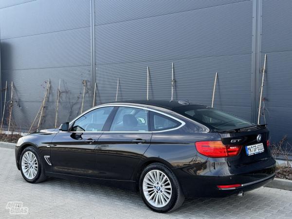 Black BMW 318 Gran Turismo 2015 in Vilnius, with an engine capacity of 2.00 L and mileage of 187 thousand km for 11950 €, photo 3 on AUTOMOTO.COM.LV