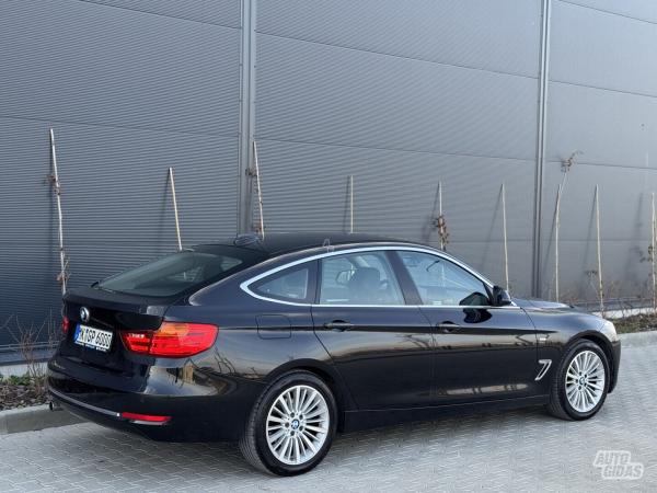 Black BMW 318 Gran Turismo 2015 in Vilnius, with an engine capacity of 2.00 L and mileage of 187 thousand km for 11950 €, photo 4 on AUTOMOTO.COM.LV