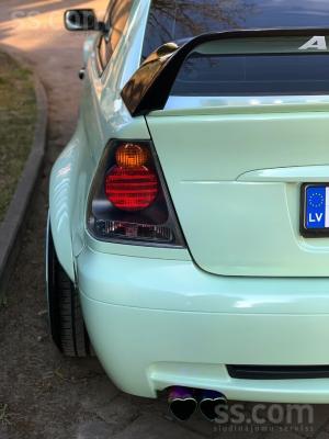 Green BMW 318 2004 in Riga, with an engine capacity of 2.00 L and mileage of 234 thousand km for 7500 €, photo 6 on AUTOMOTO.COM.LV