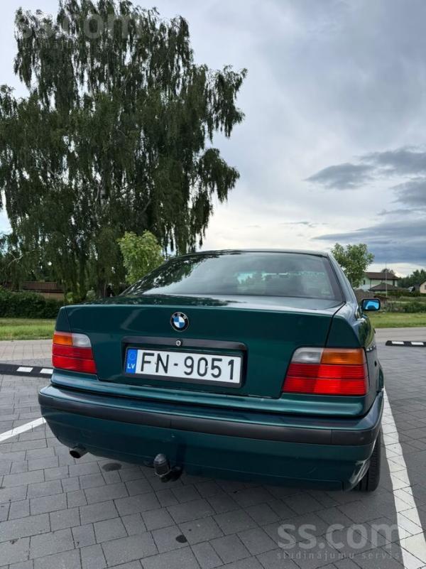 Green BMW 318 1993 in Riga, with an engine capacity of 1.80 L and mileage of 247 thousand km for 3250 €, photo 8 on AUTOMOTO.COM.LV