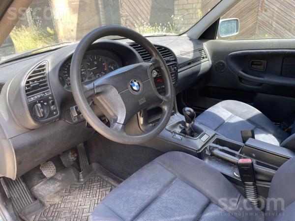 Green BMW 318 1998 in Riga, with an engine capacity of 1.80 L and mileage of 260 thousand km for 1500 €, photo 4 on AUTOMOTO.COM.LV