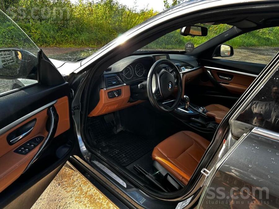 Grey BMW 318 2013 in Riga, with an engine capacity of 2.00 L and mileage of 230 thousand km for 11500 €, photo 11 on AUTOMOTO.COM.LV