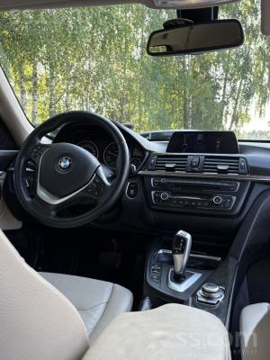 Grey BMW 318 2014 in Riga, with an engine capacity of 2.00 L and mileage of 306 thousand km for 9200 €, photo 9 on AUTOMOTO.COM.LV