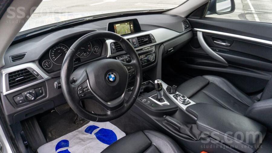 Grey BMW 318 2016 in Riga, with an engine capacity of 2.00 L and mileage of 178 thousand km for 14290 €, photo 11 on AUTOMOTO.COM.LV