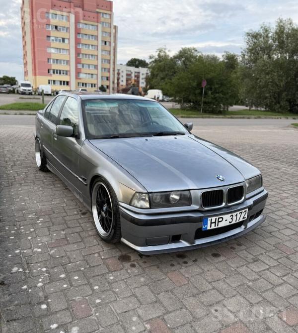 Grey BMW 318 1993 in Liepaja, with an engine capacity of 2.00 L and mileage of 438 thousand km for 3450 €, photo 1 on AUTOMOTO.COM.LV