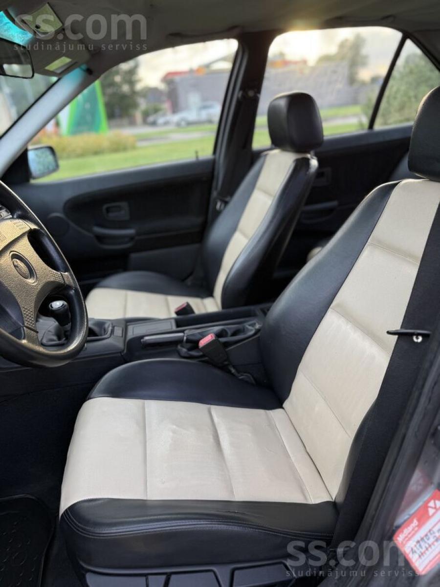 Grey BMW 318 1993 in Liepaja, with an engine capacity of 2.00 L and mileage of 438 thousand km for 3450 €, photo 7 on AUTOMOTO.COM.LV