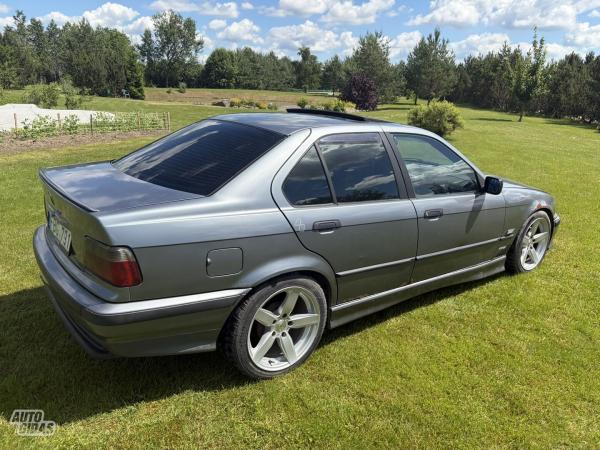 Grey BMW 318 1995 in Plunge, with an engine capacity of 1.80 L and mileage of 294 thousand km for 2300 €, photo 5 on AUTOMOTO.COM.LV