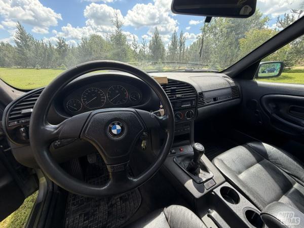 Grey BMW 318 1995 in Plunge, with an engine capacity of 1.80 L and mileage of 294 thousand km for 2300 €, photo 7 on AUTOMOTO.COM.LV