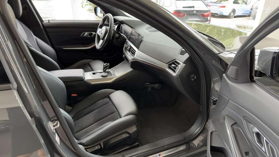 Grey BMW 318 2022 in Marijampole, with an engine capacity of 2.00 L and mileage of 218 thousand km for 23999 €, photo 16 on AUTOMOTO.COM.LV