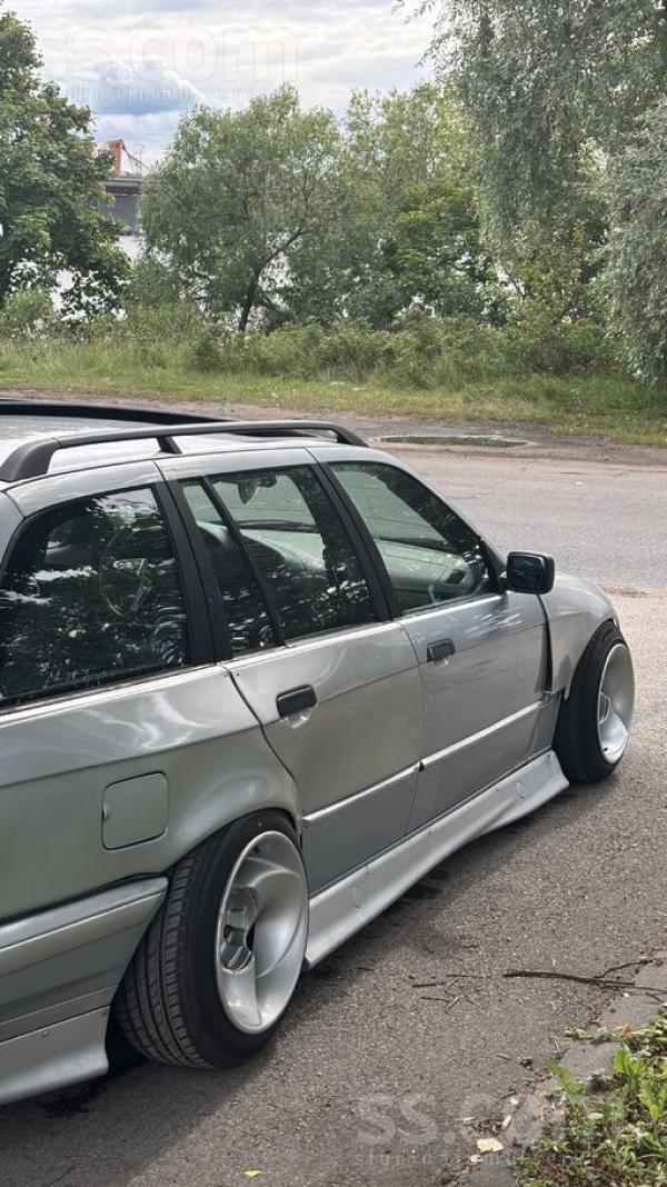 Grey BMW 318 1997 in Riga, with an engine capacity of 1.80 L and mileage of 216 thousand km for 3050 €, photo 9 on AUTOMOTO.COM.LV