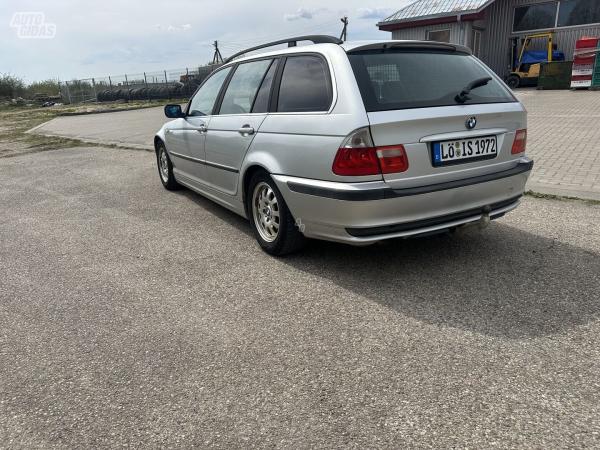 Grey BMW 318 2004 in Marijampole, with an engine capacity of 2.00 L and mileage of 305 thousand km for 1299 €, photo 3 on AUTOMOTO.COM.LV