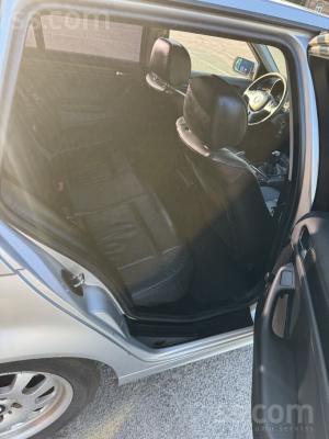 Grey BMW 318 2005 in Riga, with an engine capacity of 2.00 L and mileage of 349 thousand km for 2300 €, photo 12 on AUTOMOTO.COM.LV