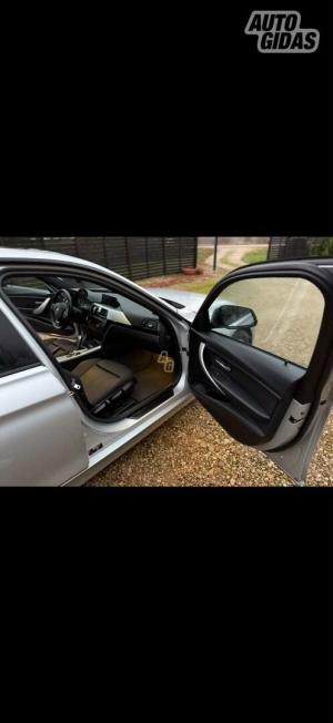 Grey BMW 318 2013 in Skuodas, with an engine capacity of 2.00 L and mileage of 219 thousand km for 6700 €, photo 12 on AUTOMOTO.COM.LV