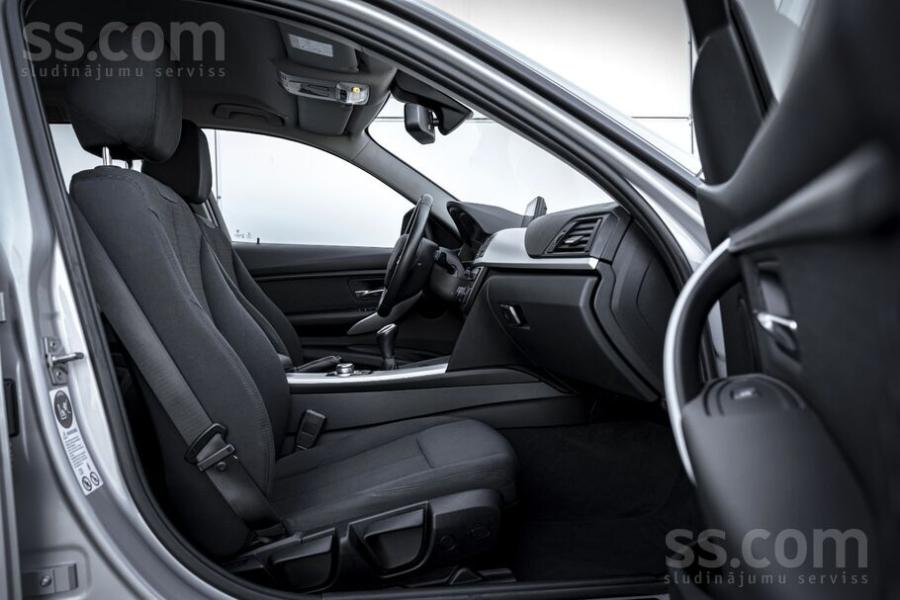 Grey BMW 318 2014 in Riga, with an engine capacity of 2.00 L and mileage of 214 thousand km for 7490 €, photo 11 on AUTOMOTO.COM.LV