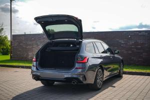 Grey BMW 318 2022 in Marijampole, with an engine capacity of 2.00 L and mileage of 127 thousand km for 21950 €, photo 14 on AUTOMOTO.COM.LV
