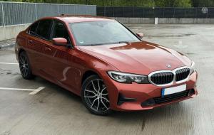 Orange BMW 318 2020 in Vilnius, with an engine capacity of 2.00 L and mileage of 149 thousand km for 17499 €, photo 8 on AUTOMOTO.COM.LV