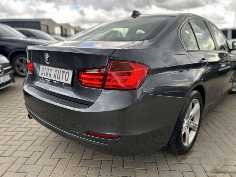 Red BMW 318 2014 in Kaunas, with an engine capacity of 2.00 L and mileage of 234 thousand km for 9550 €, photo 10 on AUTOMOTO.COM.LV