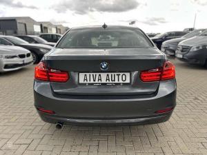 Red BMW 318 2014 in Kaunas, with an engine capacity of 2.00 L and mileage of 234 thousand km for 9550 €, photo 11 on AUTOMOTO.COM.LV