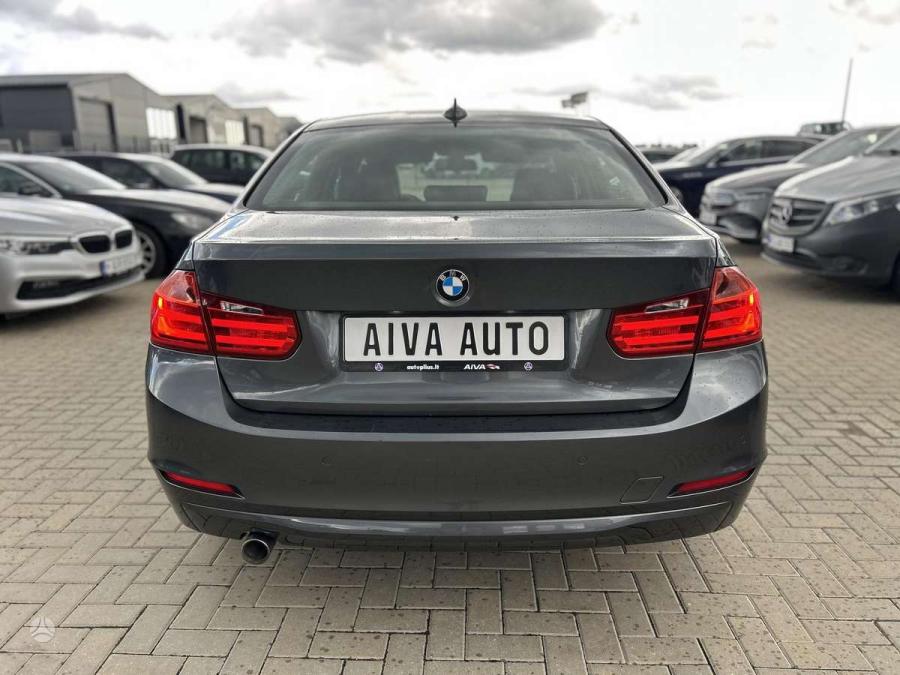 Red BMW 318 2014 in Kaunas, with an engine capacity of 2.00 L and mileage of 234 thousand km for 9550 €, photo 11 on AUTOMOTO.COM.LV