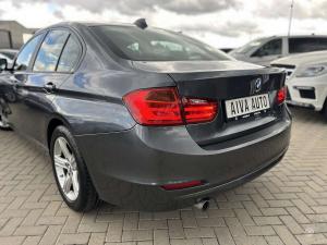 Red BMW 318 2014 in Kaunas, with an engine capacity of 2.00 L and mileage of 234 thousand km for 9550 €, photo 12 on AUTOMOTO.COM.LV