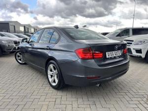 Red BMW 318 2014 in Kaunas, with an engine capacity of 2.00 L and mileage of 234 thousand km for 9550 €, photo 14 on AUTOMOTO.COM.LV
