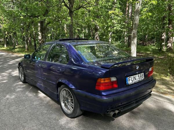 Violet BMW 318 1994 in Panevezys, with an engine capacity of 1.80 L and mileage of 357 thousand km for 2600 €, photo 6 on AUTOMOTO.COM.LV