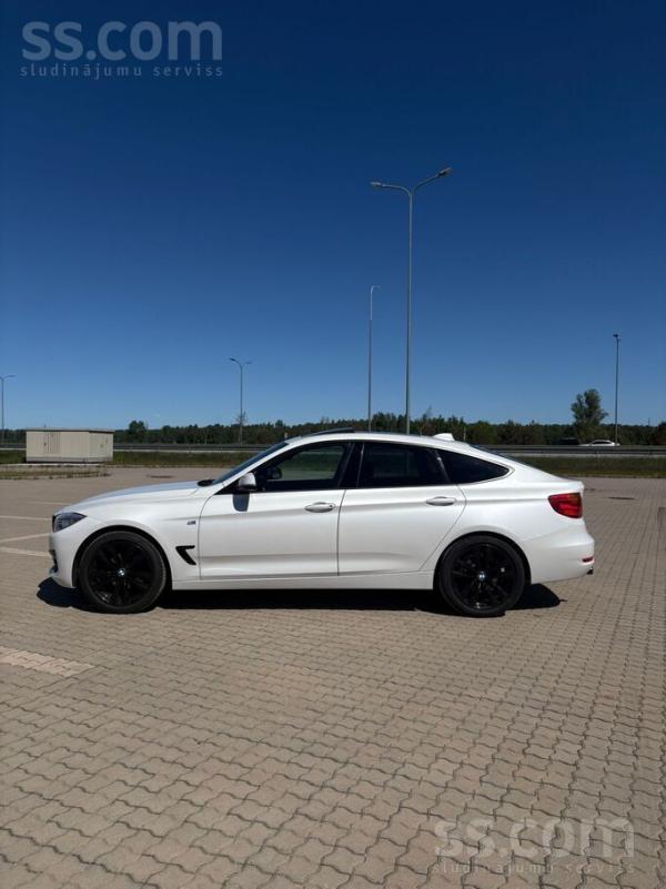 White BMW 318 2013 in Jurmala, with an engine capacity of 2.00 L and mileage of 217 thousand km for 12500 €, photo 8 on AUTOMOTO.COM.LV