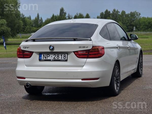 White BMW 318 2013 in Liepaja, with an engine capacity of 2.00 L and mileage of 355 thousand km for 8990 €, photo 5 on AUTOMOTO.COM.LV
