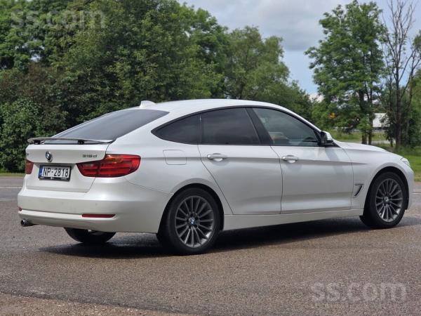White BMW 318 2013 in Liepaja, with an engine capacity of 2.00 L and mileage of 355 thousand km for 8990 €, photo 6 on AUTOMOTO.COM.LV