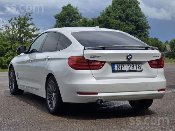 White BMW 318 2013 in Liepaja, with an engine capacity of 2.00 L and mileage of 355 thousand km for 8990 €, photo 7 on AUTOMOTO.COM.LV