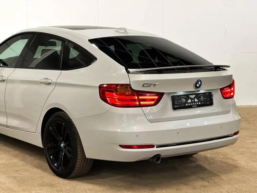 White BMW 318 2013 in Jurmala, with an engine capacity of 2.00 L and mileage of 295 thousand km for 12450 €, photo 14 on AUTOMOTO.COM.LV