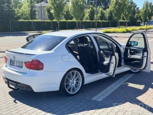 White BMW 318 2009 in Riga, with an engine capacity of 2.00 L and mileage of 332 thousand km for 3999 €, photo 4 on AUTOMOTO.COM.LV