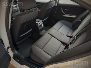 White BMW 318 2011 in Jelgava, with an engine capacity of 2.00 L and mileage of 376 thousand km for 4680 €, photo 14 on AUTOMOTO.COM.LV
