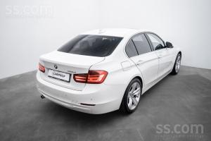 White BMW 318 2013 in Tallinn, with an engine capacity of 2.00 L and mileage of 169 thousand km for 12999 €, photo 4 on AUTOMOTO.COM.LV